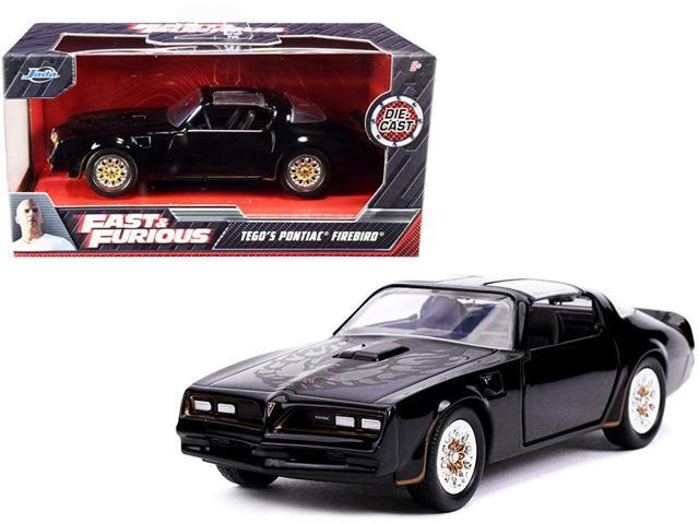 Click here for Tegos Pontiac Firebird Black with Gold Stripes and... prices