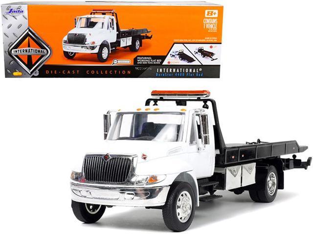 Click here for International DuraStar 4400 Flatbed Tow Truck Whit... prices