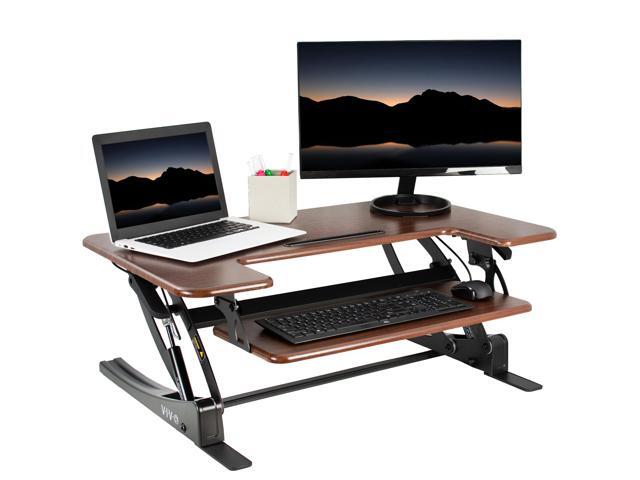 Click here for VIVO Dark Wood Height Adjustable Standing Desk Mon... prices