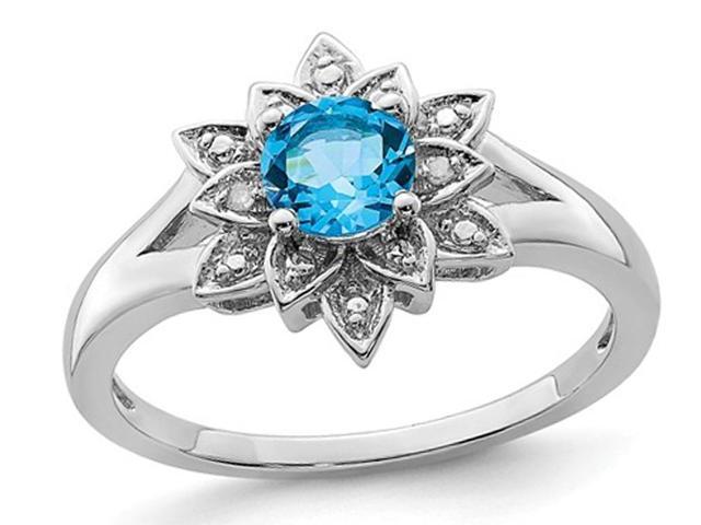 Click here for 3/5 Carat (ctw) Blue Topaz Flower Ring in Sterling... prices