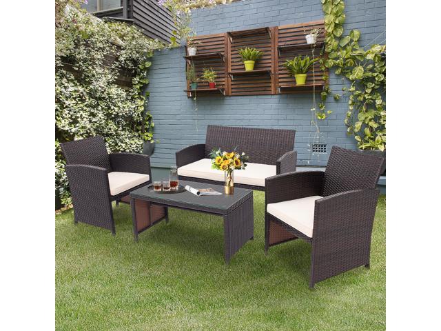 Click here for Costway 4PCS Patio Rattan Furniture Set Cushioned... prices