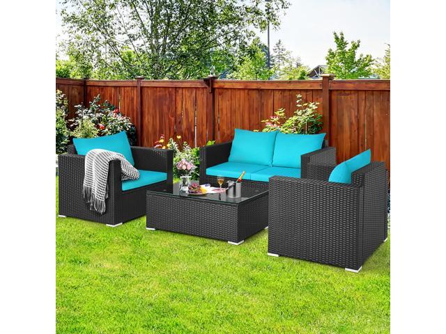 Click here for Costway 4PCS Patio Rattan Cushioned Sofa Chair Cof... prices