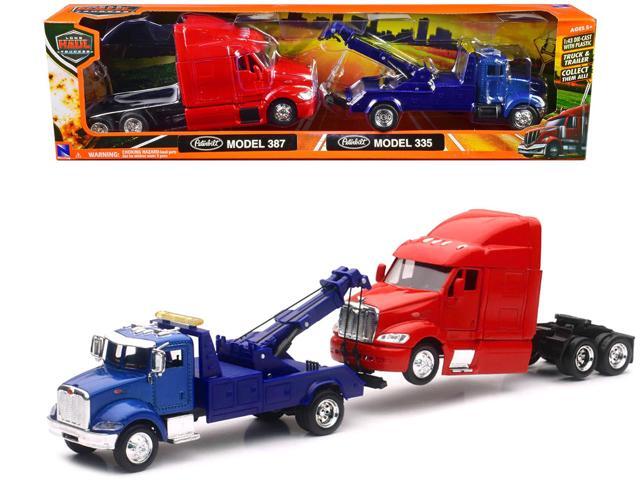 Click here for Peterbilt Model 335 Tow Truck Blue and Peterbilt M... prices