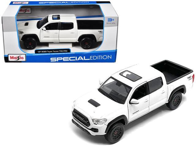 Click here for 2023 Toyota Tacoma TRD PRO Pickup Truck White with... prices