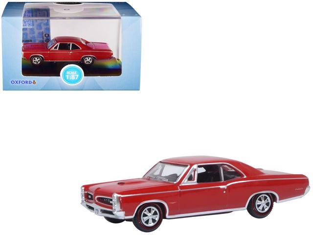Click here for 1966 Pontiac GTO Montero Red 1/87 (HO) Scale Dieca... prices