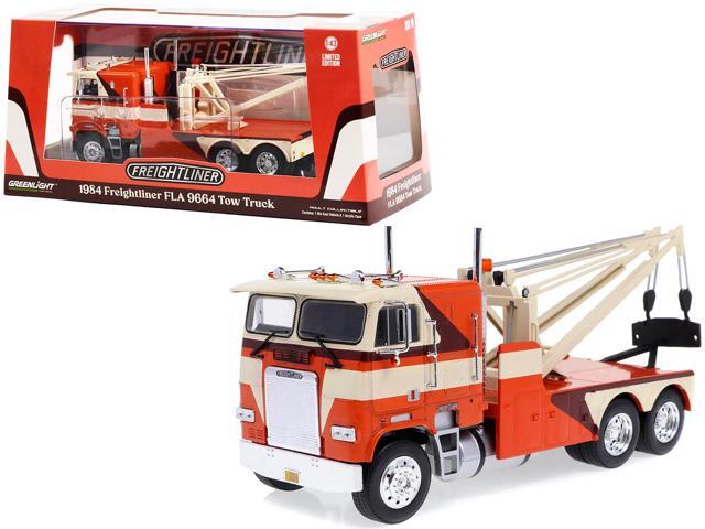 Click here for 1984 Freightliner FLA 9664 Tow Truck Orange and Wh... prices
