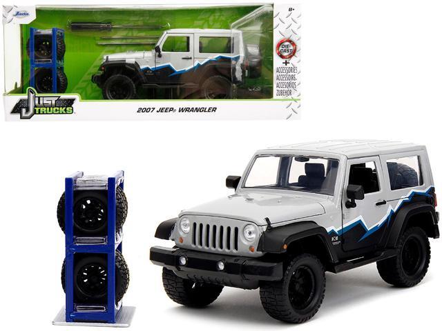 Click here for 2007 Jeep Wrangler Gray and Black with Blue and Wh... prices