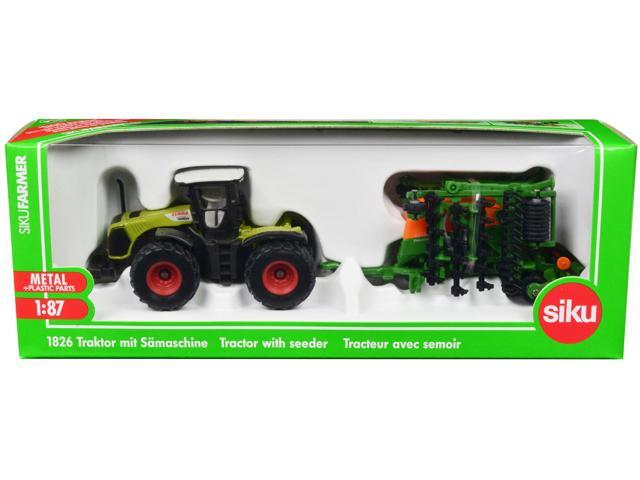 Click here for Claas Xerion 5000 Tractor Green with Gray Top and... prices
