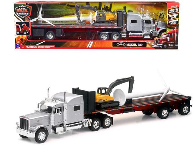 Click here for Peterbilt 389 Truck with Flatbed Trailer Silver Me... prices