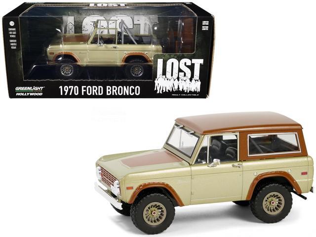 Click here for 1970 Ford Bronco Gold Metallic with Brown Hood and... prices