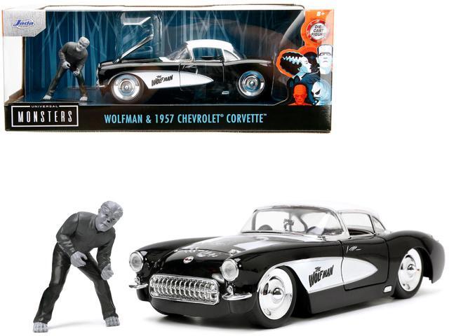 Click here for 1957 Chevrolet Corvette Black w/White Top and Wolf... prices