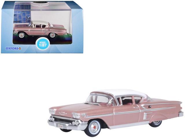 Click here for 1958 Chevrolet Impala Sport Cay Coral Pink Metalli... prices