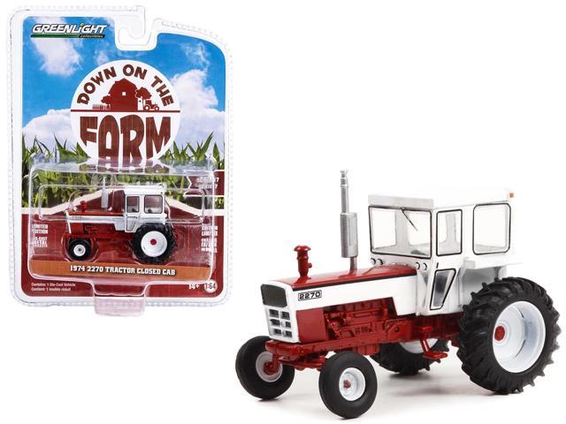 Click here for 1974 2270 Tractor Closed Cab Red and White Down on... prices
