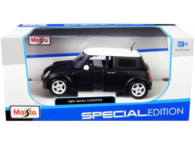 Click here for Mini Cooper Matt Black with White Top 1/24 Diecast... prices