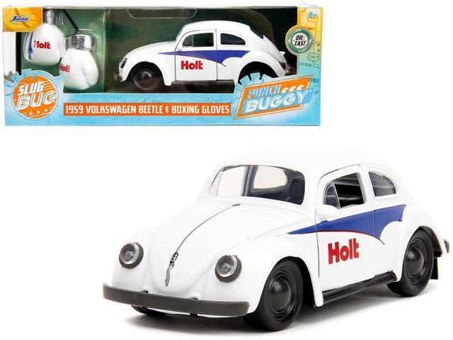 Click here for 1959 Volkswagen Beetle Holt White w/Blue Graphics... prices