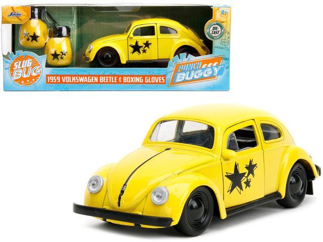 Click here for 1959 Volkswagen Beetle Yellow with Black Graphics... prices