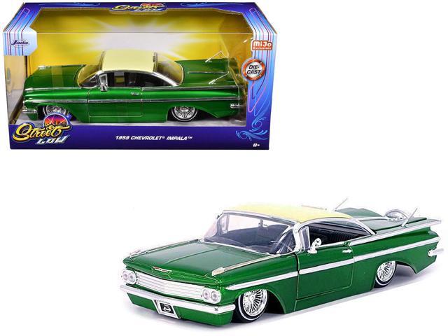 Click here for 1959 Chevrolet Impala Lowrider Green Metallic with... prices