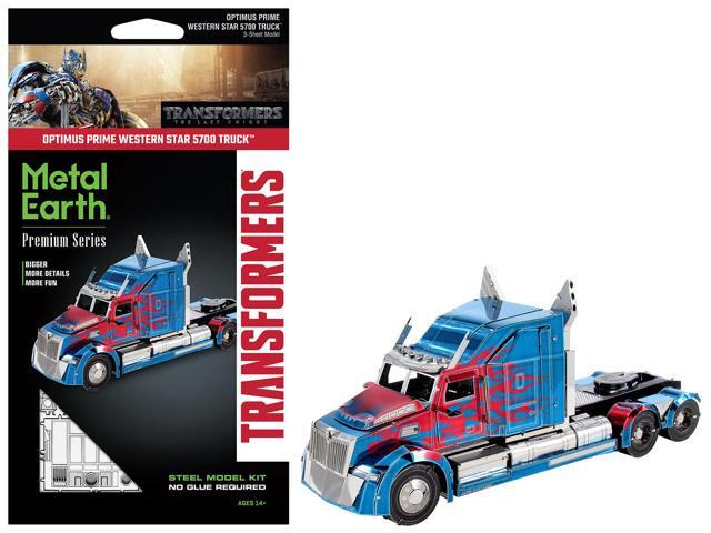 Click here for Model Kit Western Star 5700 Truck Blue w/Flames Tr... prices