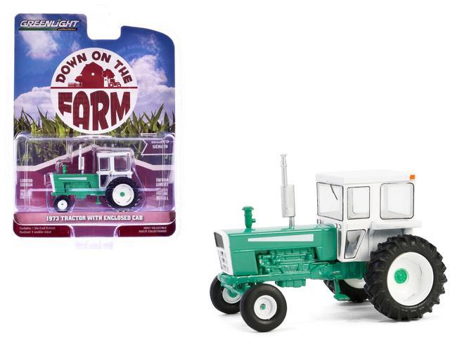 Click here for 1973 Tractor with Closed Cab Green and White Down... prices