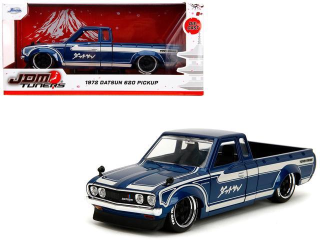 Click here for 1972 Datsun 620 Pickup Truck Blue Metallic and Cre... prices