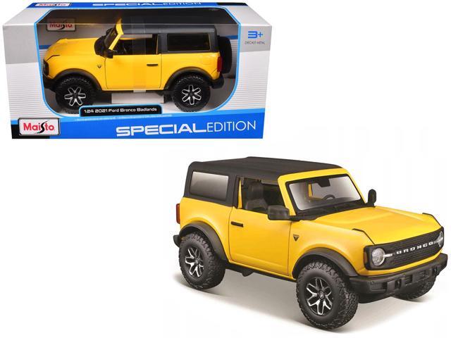 Click here for 2021 Ford Bronco Badlands Yellow with Black Top Sp... prices