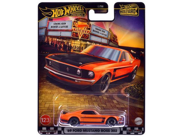 Click here for 1969 Ford Mustang Boss 302 Orange with Black Strip... prices