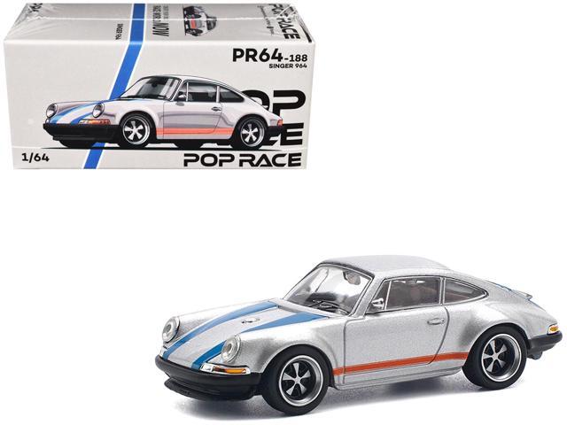 Click here for Singer 964 Silver Metallic with Blue and Red Strip... prices
