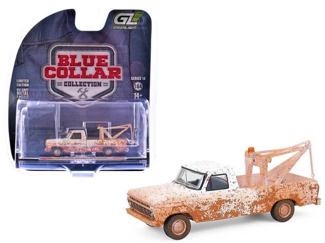 Click here for 1973 Ford F-100 Tow Truck White (Weathered) Blue C... prices