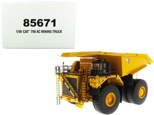 Click here for Diecast Masters 1/50 Cat 798 Ac Mining Truck  High... prices
