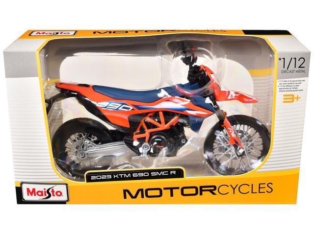 Click here for 2023 KTM 690 SMC R Orange and Blue 1/12 Diecast Mo... prices