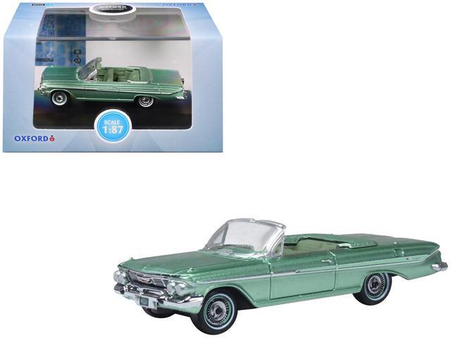 Click here for 1961 Chevrolet Impala Convertible Arbor Green Meta... prices