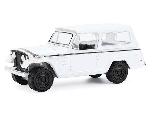 Click here for 1971 Jeep Jeepster Commando White with Black Strip... prices