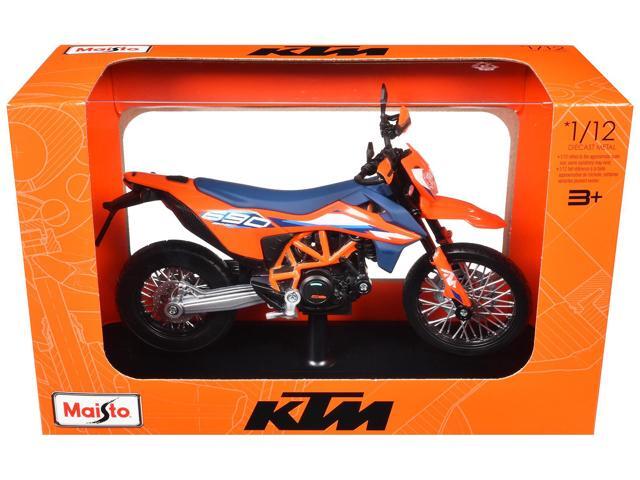 Click here for 2023 KTM 690 SMC R Orange and Blue with Display Ba... prices