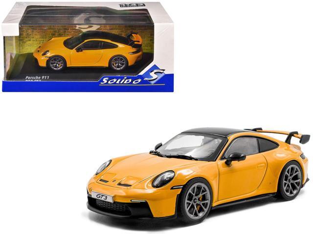 Click here for 2023 Porsche 911 (992) GT3 Signal Yellow with Blac... prices