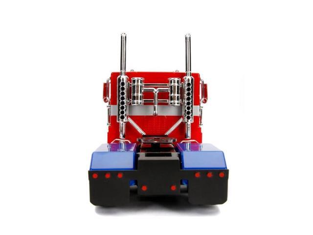 Click here for G1 Autobot Optimus Prime Truck Red w/Robot on Chas... prices