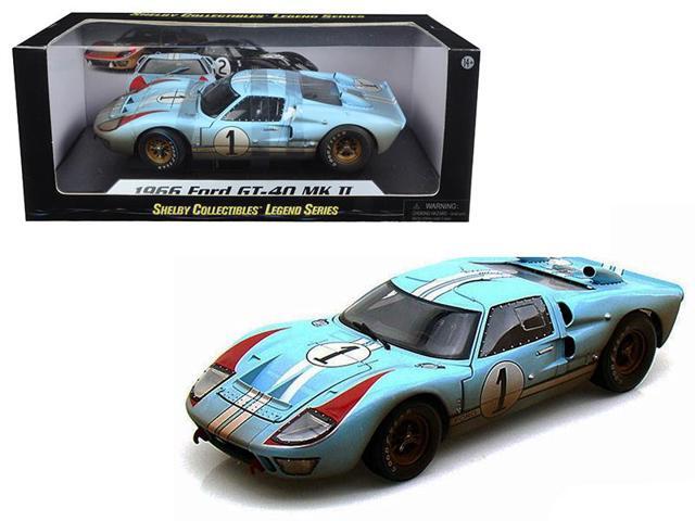 Click here for 1966 Ford GT-40 MK II #1 Light Blue Miles - Hulme... prices