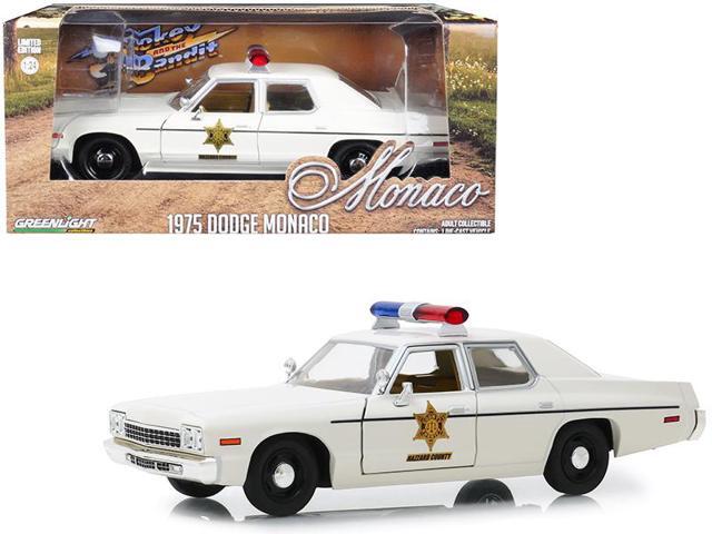 Click here for 1975 Dodge Monaco Cream Hazzard County Sheriff 1/2... prices