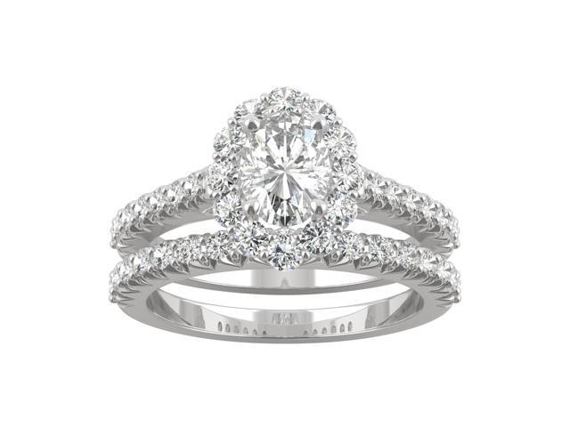 Click here for 14K White Gold Moissanite by Charles & Colvard 7x5... prices