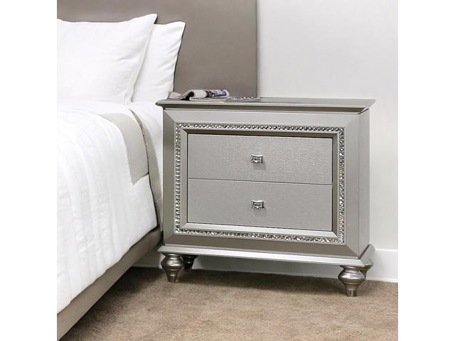 Click here for Kaitlyn Champagne Finish Nightstand prices