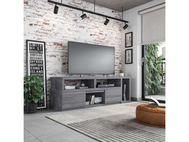 Click here for Techni Mobili Adjustable TV Stand Console for TVs... prices