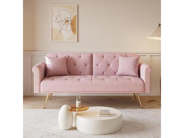 Click here for A 69.7-inch-long sofa bed covered in pink velvet f... prices