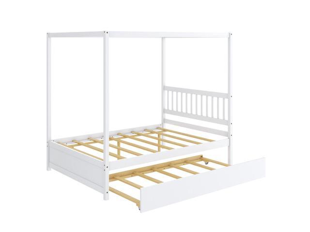 Click here for SlickBlue Full Size Canopy Bed with Trundle Wooden... prices