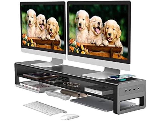 Click here for 2 Tiers Dual Monitor Stand with Auto Charging Pad... prices
