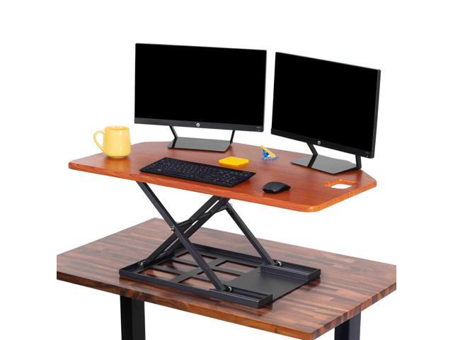 Click here for X-Elite Pro 40 Corner Standing Desk Converter with... prices
