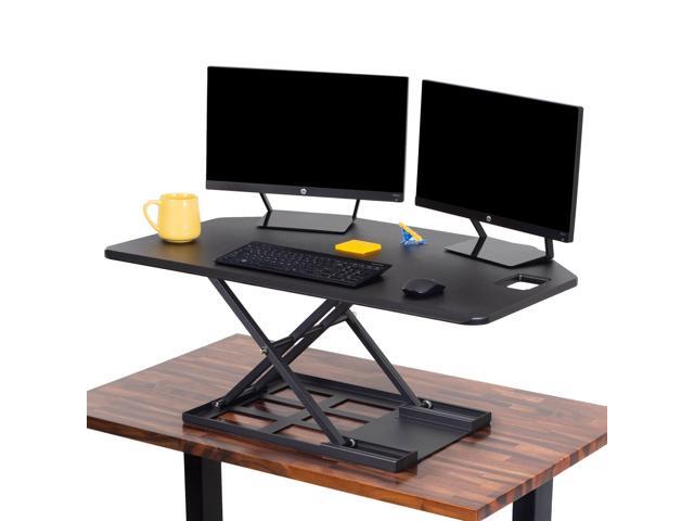 Click here for X-Elite Pro 40 Corner Standing Desk Converter with... prices
