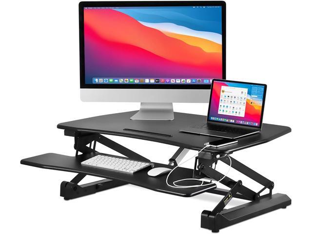 Click here for Mount-It! Electric Standing Desk Converter 35.4 Qu... prices