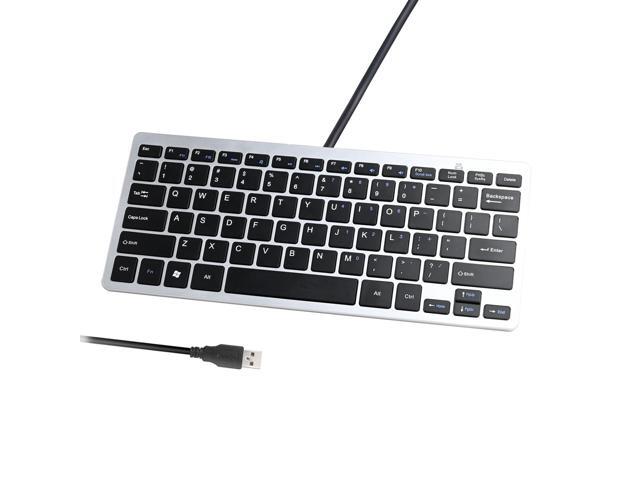 Click here for Ultra Thin Mini USB Wired Compact Keyboard for PC... prices