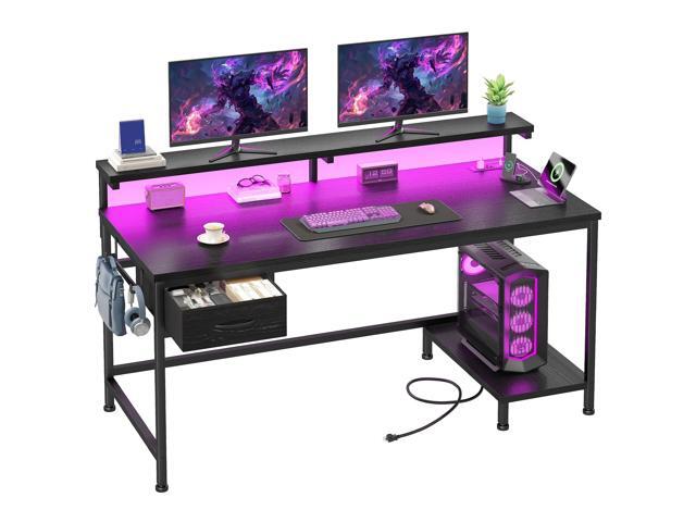 Click here for 39.3 Gaming Desk with Power Outlet and LED Lights... prices