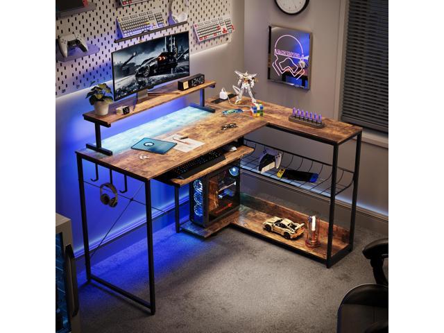 Click here for L Shaped Gaming Desk with Power Outlets & RGB Ligh... prices