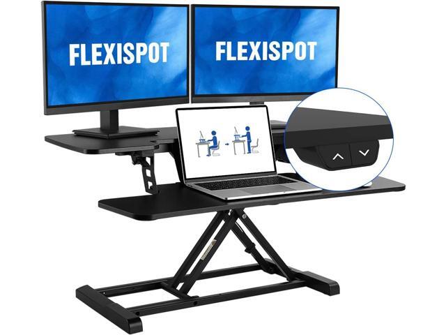 Click here for FLEXISPOT Electric Standing Desk Converter 36 Wide... prices